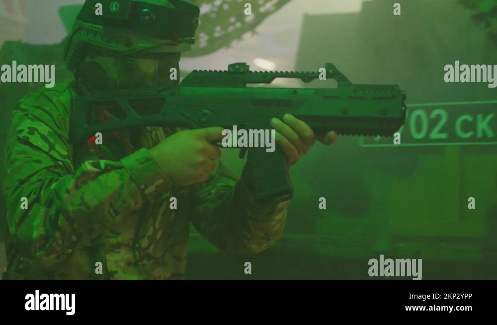 Side view of special force soldier or laser tag player . Swat man with ...