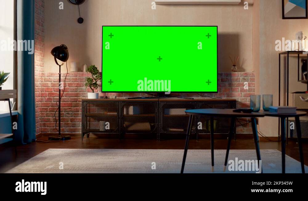 TV with Green Screen in Loft Apartment Stock Video Footage - Alamy