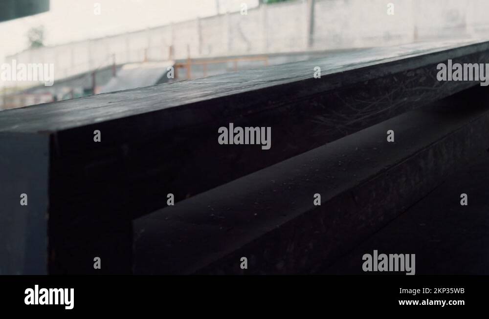 Sports ramp for skate boarding at skatepark. Closeup empty skate board ...