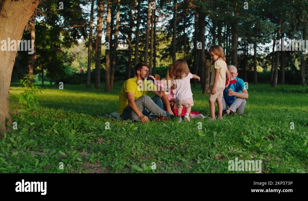 Parents and kids playing outside Stock Videos & Footage - HD and 4K ...