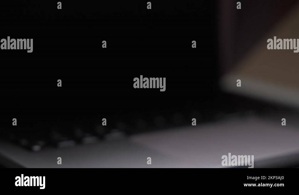 Cinematic footage of an Apple M1 MacBook Pro 14 inch with an overhead ...