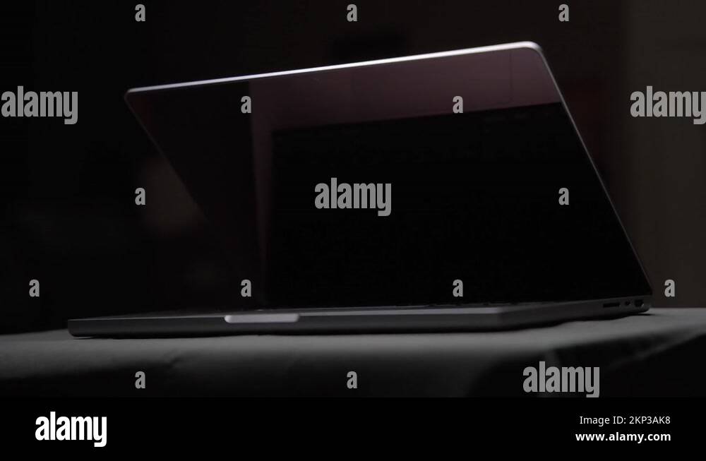 Cinematic footage of an Apple M1 MacBook Pro 14 inch with an overhead ...