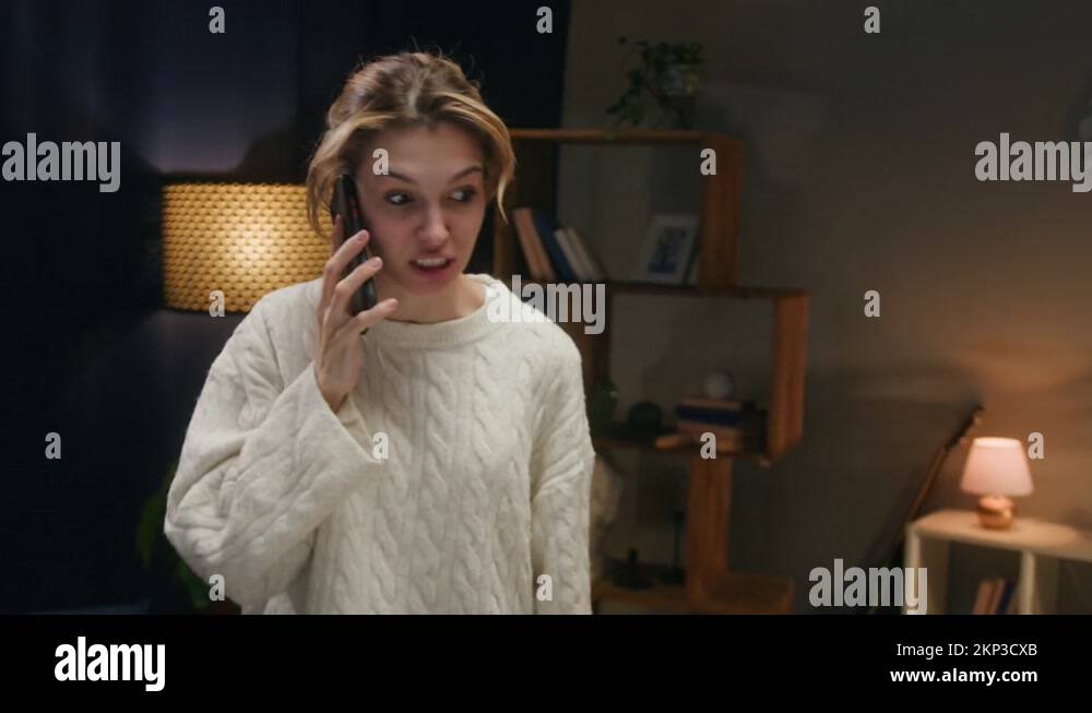 Angry woman calling on phone and shouting, portrait of screaming female ...