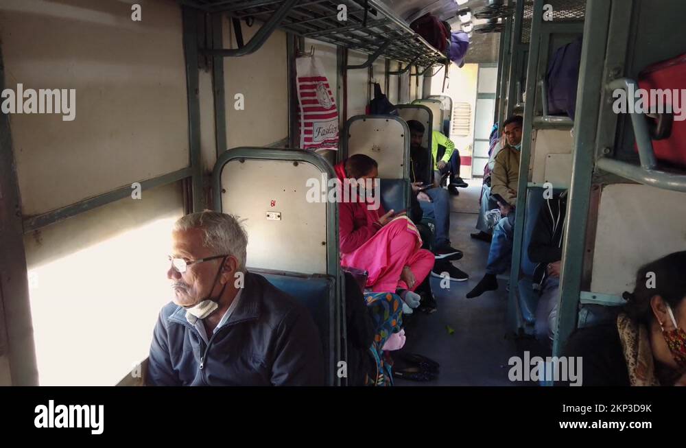 Shot Inside of Indian Train during ride between city, people speaking ...