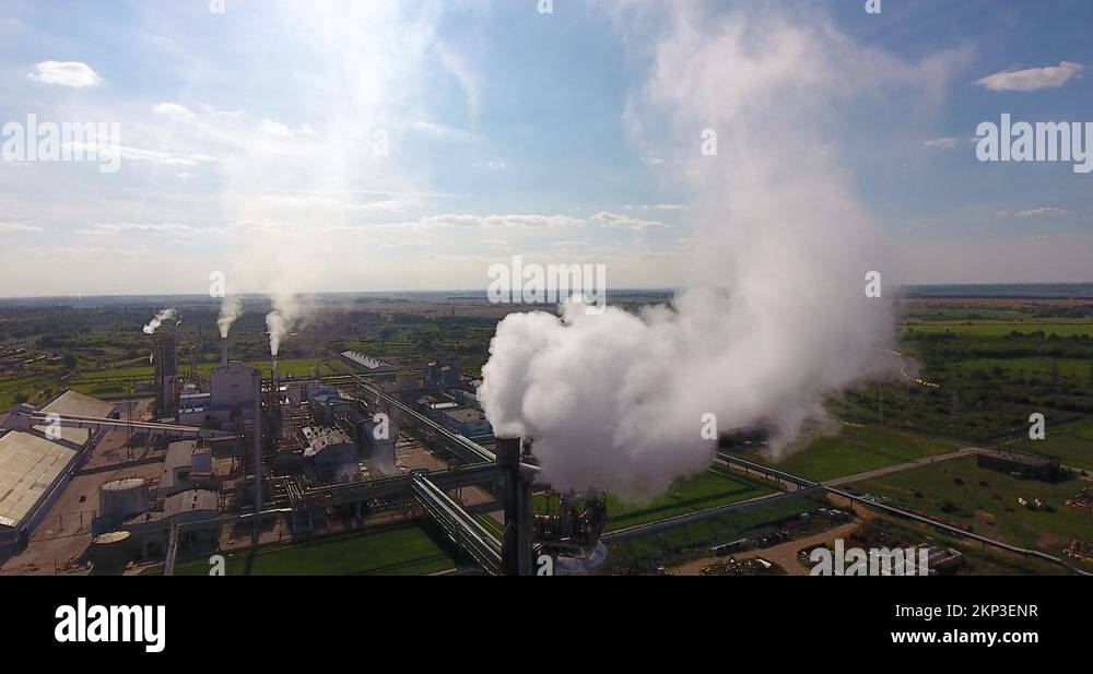 Thick steam from a pipe at a chemical factory Stock Video Footage - Alamy