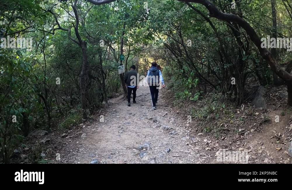 Locals in traditional dress walking the Margalla Hills Islamabad Stock ...
