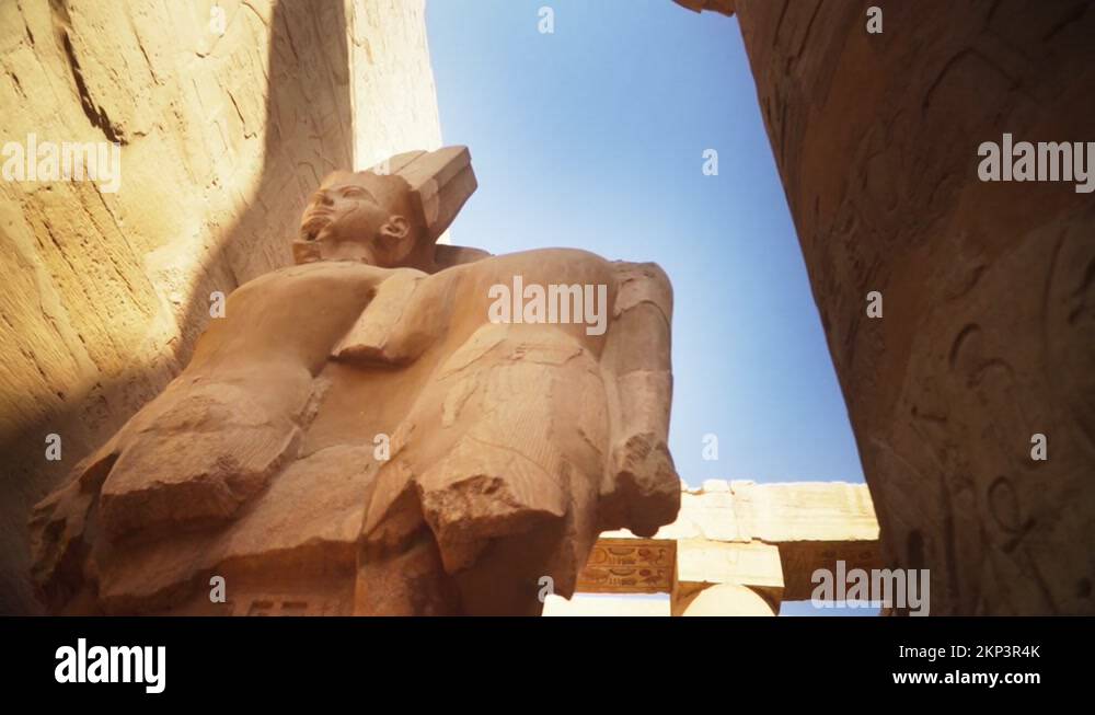 Statue of King Ramses in the Karnak Temple, Luxor Egypt. Slow camera ...
