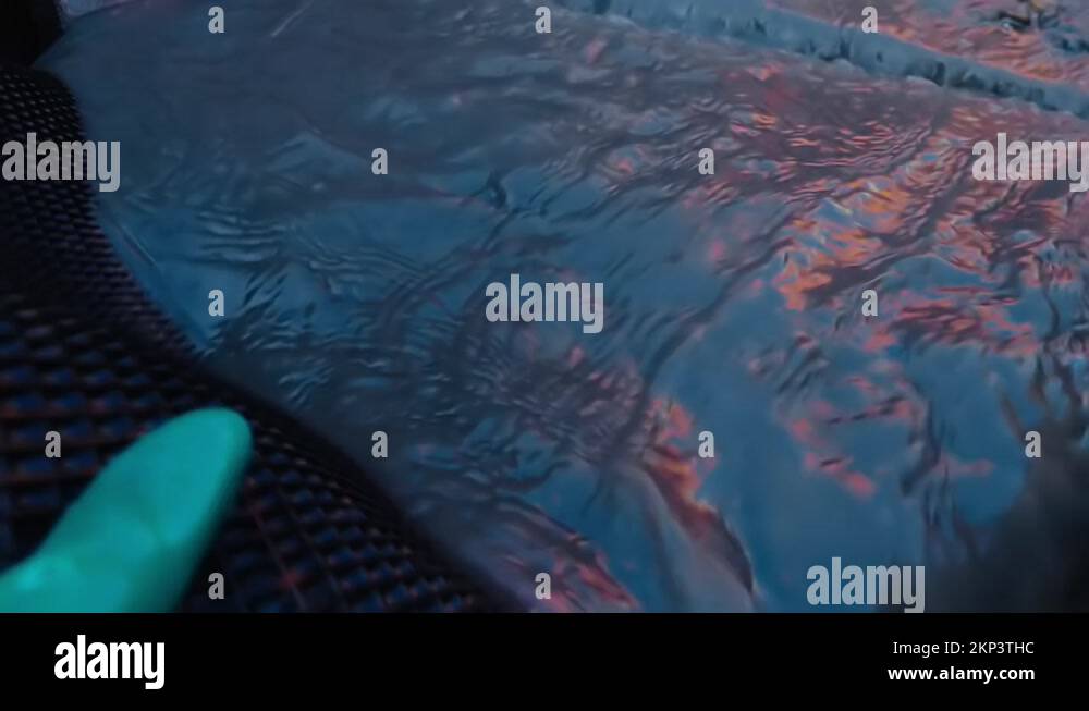 Worker Lifts Wire Mesh Filtering Gold Dust From Stones In Processing ...