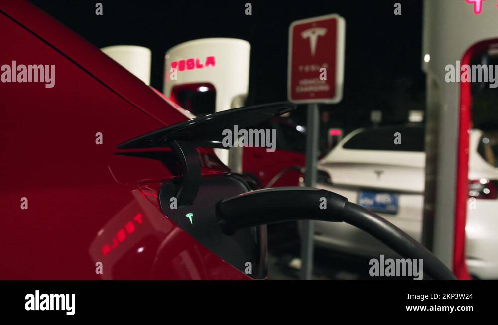 Red tesla car charging Stock Videos & Footage - HD and 4K Video Clips ...