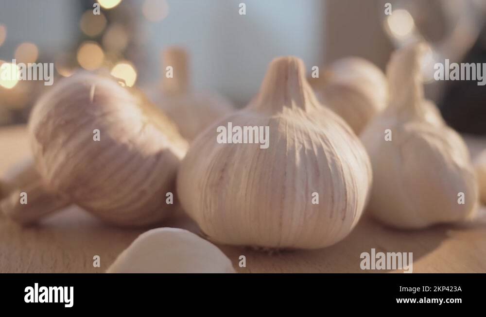 Whole garlic bulbs and cloves ready for use, close up shot Stock Video ...
