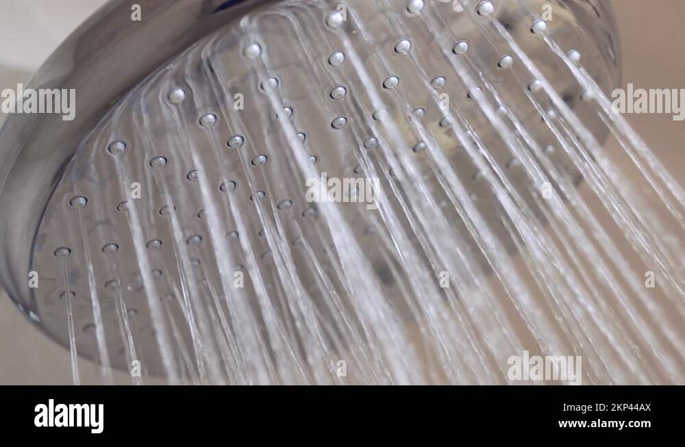 Turn off the shower head in the bathroom.Clean water flows from the ...
