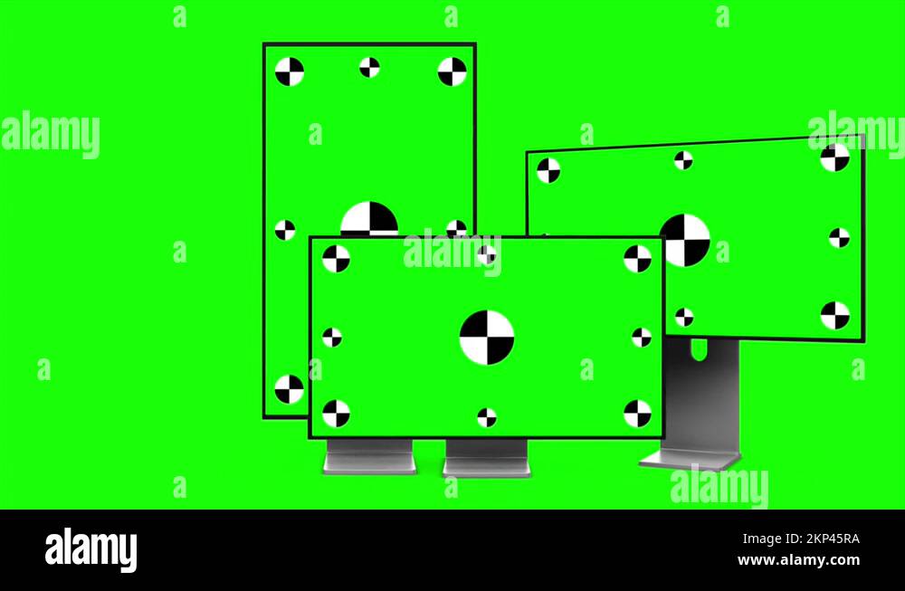 Three modern computers with green screen, isolated on green background ...