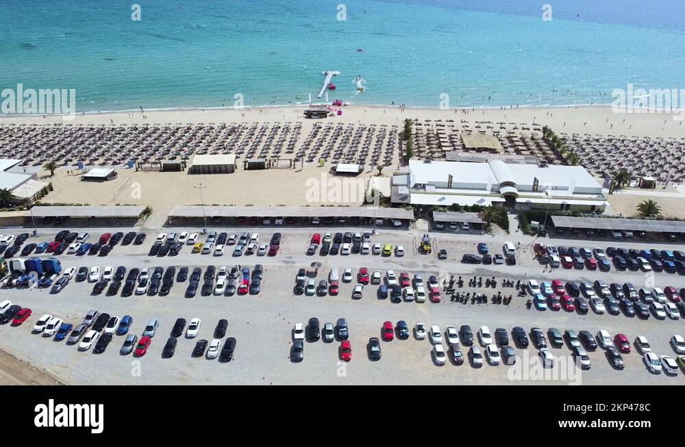 Luxury beach resort and parking full with cars. Busy weekend on the ...