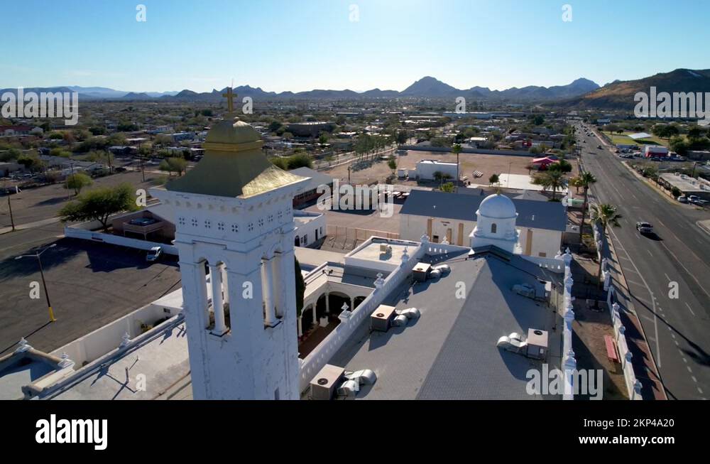 Tucson Arizona aerial push into cross above Santa Cruz Catholic Church ...
