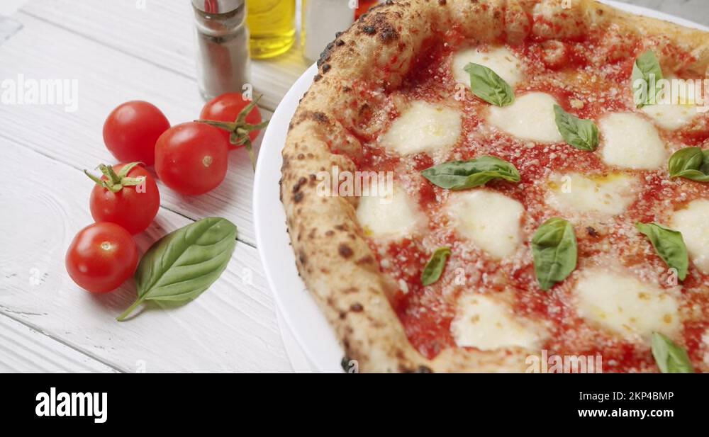 Italian pizza with mozzarella cheese, basil and cherry tomatoes.Pizza ...