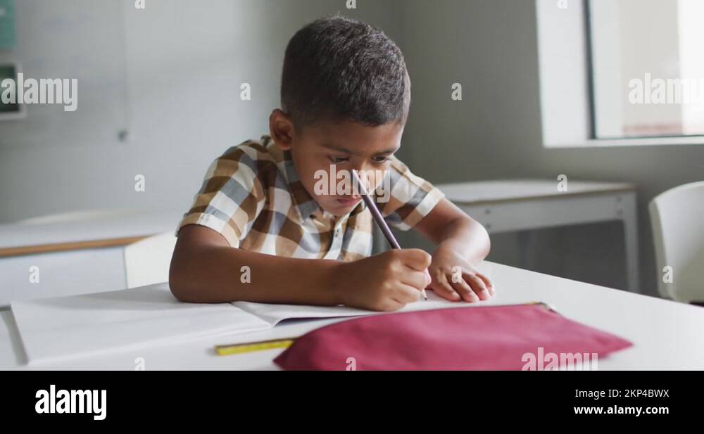 Focused boy sitting desk Stock Videos & Footage - HD and 4K Video Clips ...