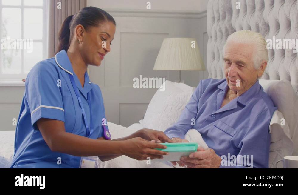 Male care worker helping Stock Videos & Footage - HD and 4K Video Clips ...