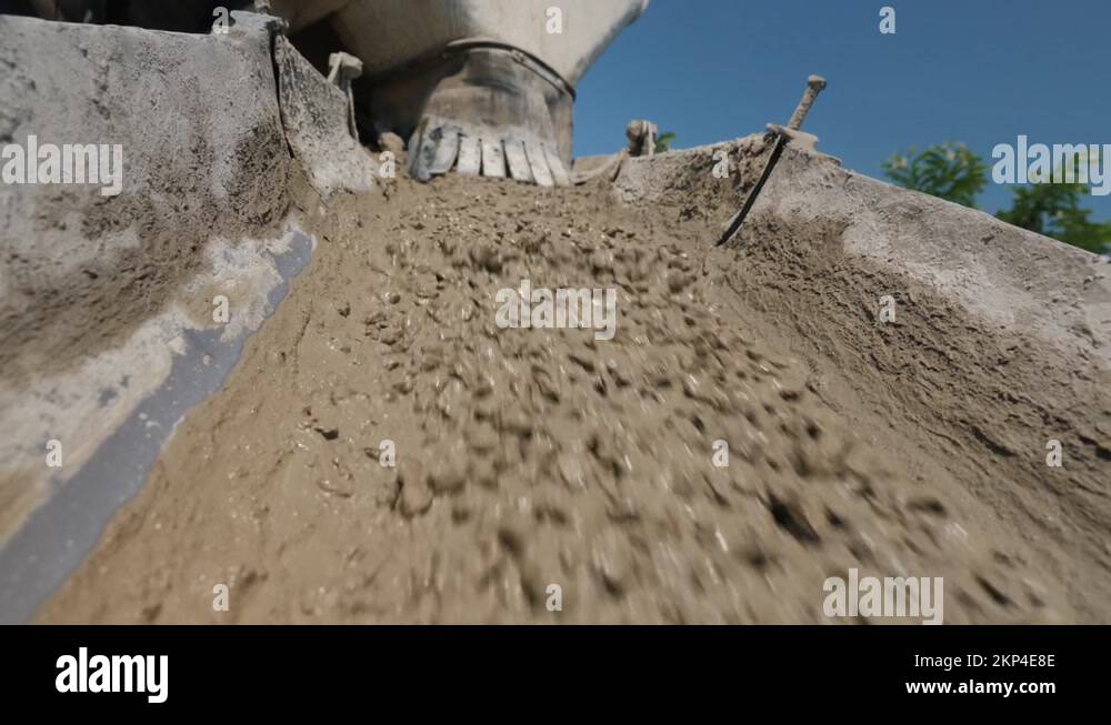 A powerful stream of concrete flows from the concrete through the ...