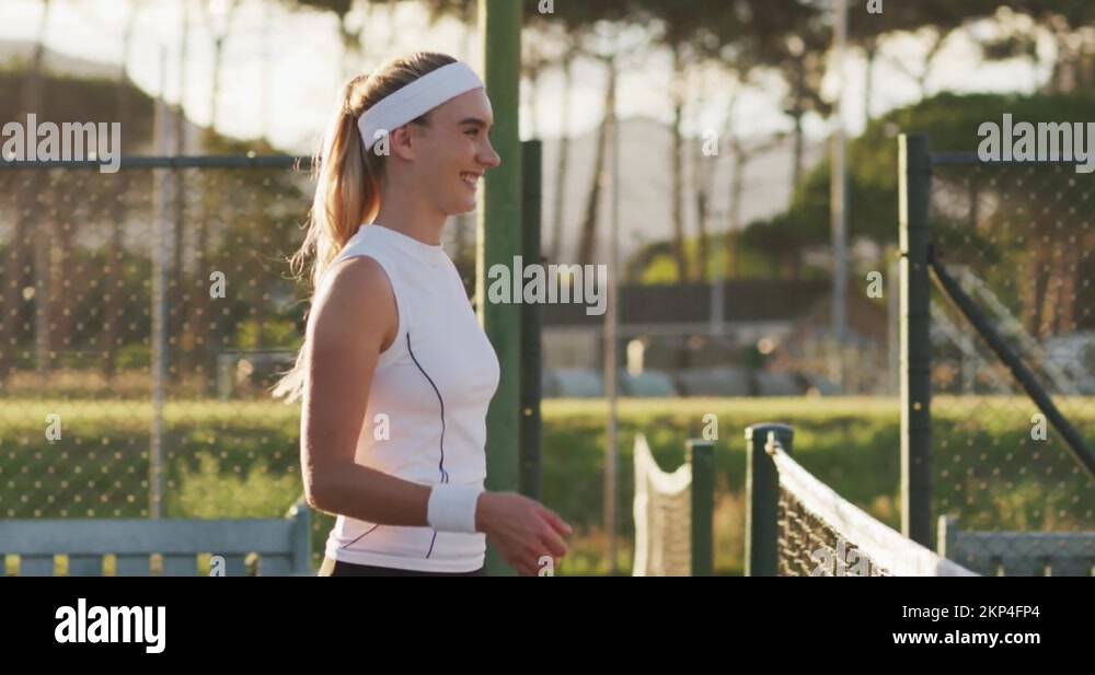 Video of happy diverse female tennis players clapping hands after match ...