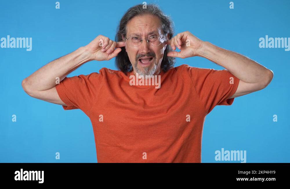 Displeased irritated sad angry elderly gray-haired bearded man 50s 60s ...