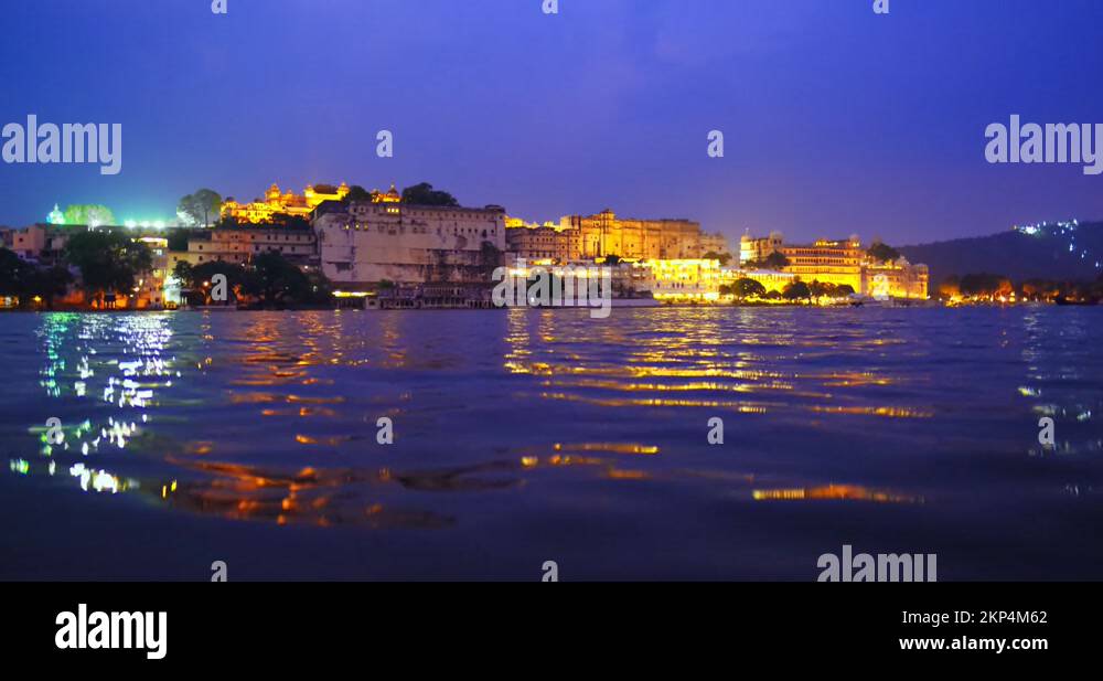Udaipur City Palace on lake Pichola at sunset - Rajput architecture of ...