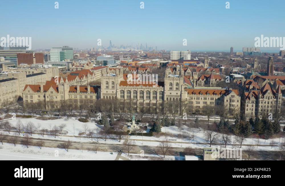 Fixed Aerial View of University of Chicago Campus with Chicago Skyline ...