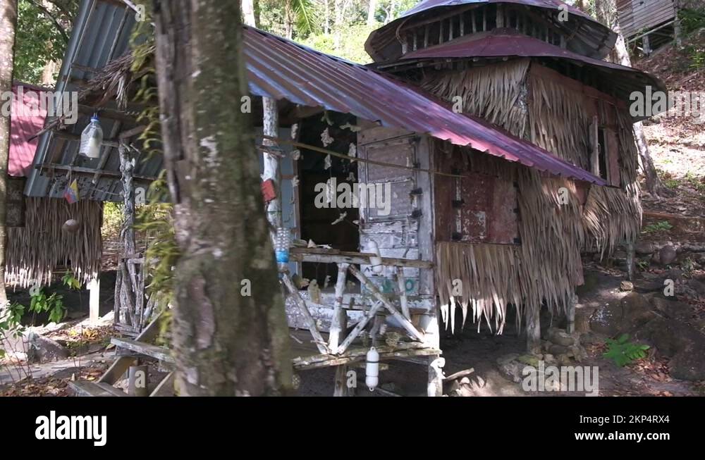 footage of old style hippy Thai beach huts that are now abandoned due ...