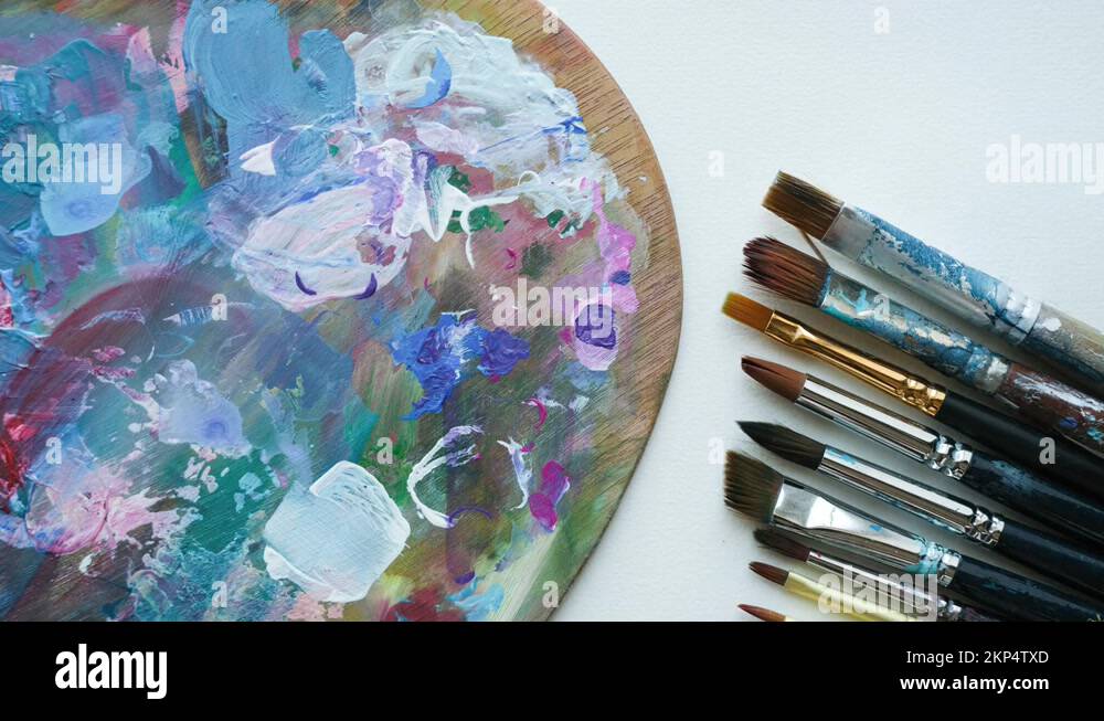 Paint-stained palette and brushes. 4K stop motion animation Stock Video ...
