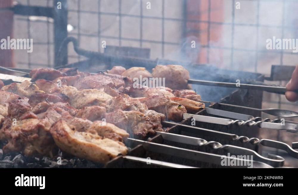 Man roasts meat on fire Stock Videos & Footage - HD and 4K Video Clips ...
