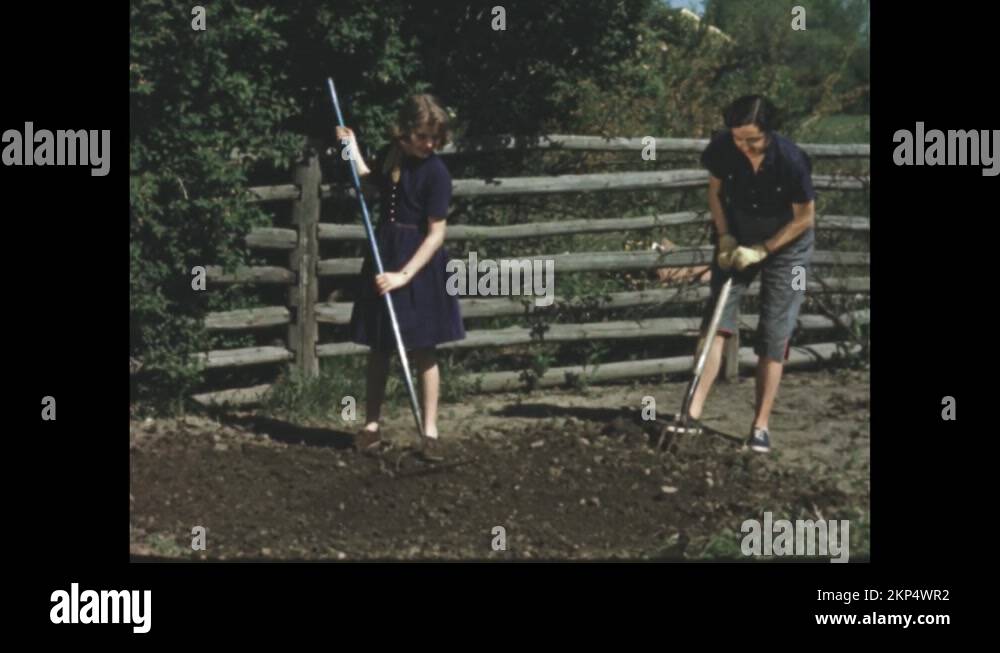 Woman hoe garden Stock Videos & Footage - HD and 4K Video Clips - Alamy