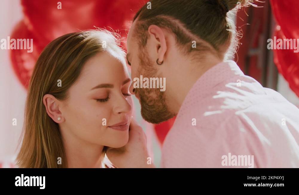 Beautiful Modern Couple Kissing Gently Touching Each Other And Looking