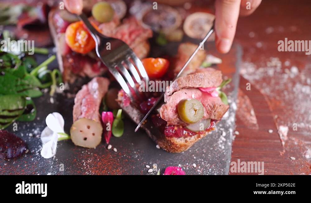Woman roast eat beef Stock Videos & Footage - HD and 4K Video Clips - Alamy