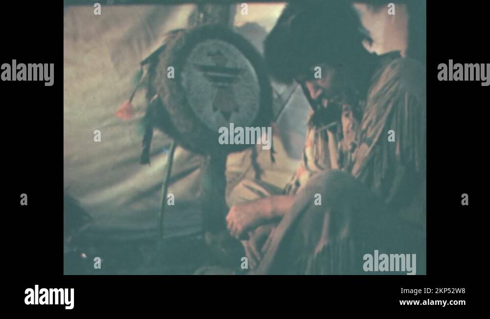 1960s: Smoke rising from fire toward top of tent Stock Video Footage ...