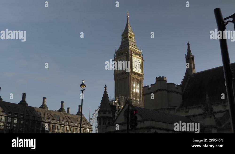 A spectacular view tracking back revealing the beautiful Big Ben bell ...