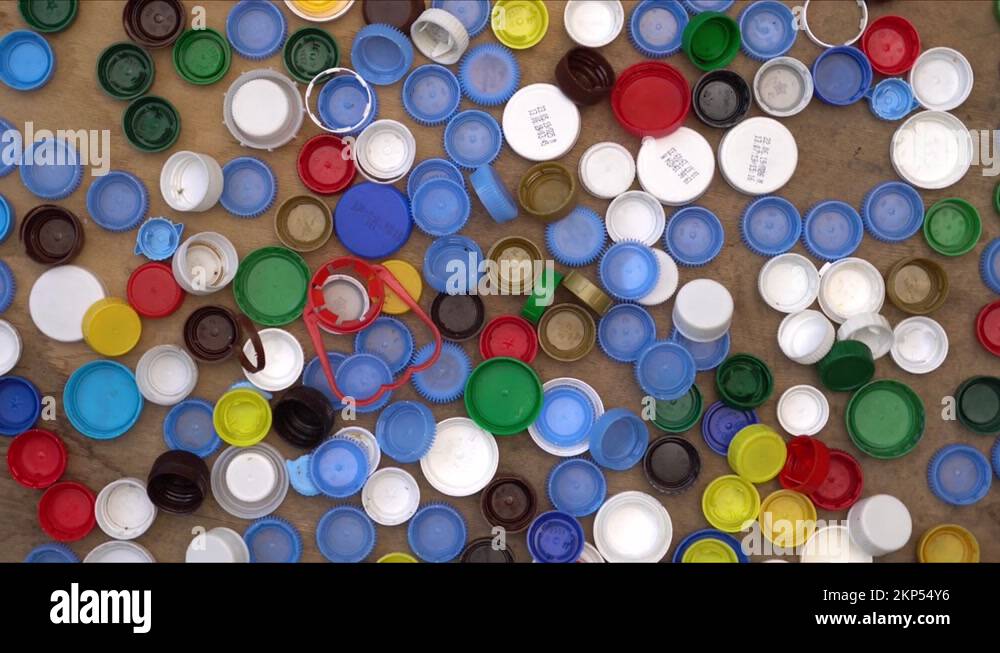 Used plastic water bottle caps. Collection, separates, sorting, plastic ...