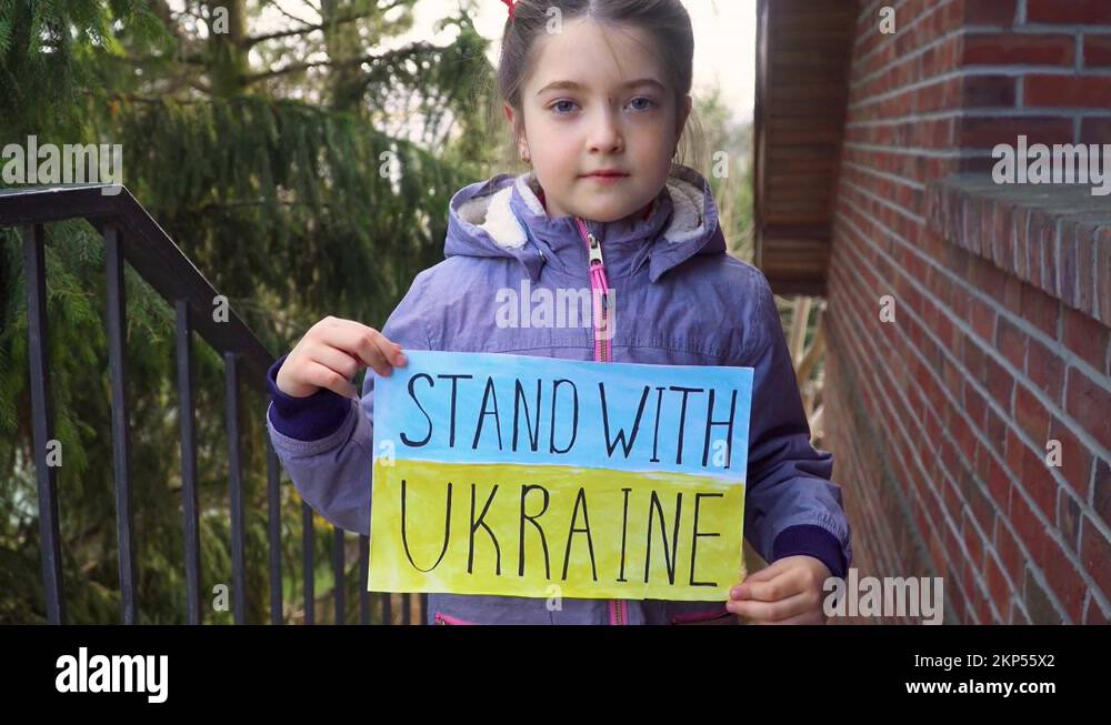 Toddler girl kid homeless protesting armored conflict holding banner ...