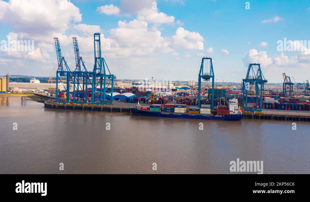 Hyper lapse of sea port , working on cargo containers in the large city ...