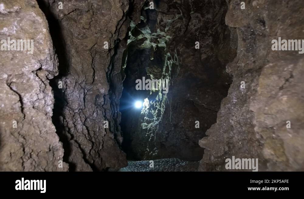 Underground city caves in Cappadocia. A walk deep in the dungeon in ...