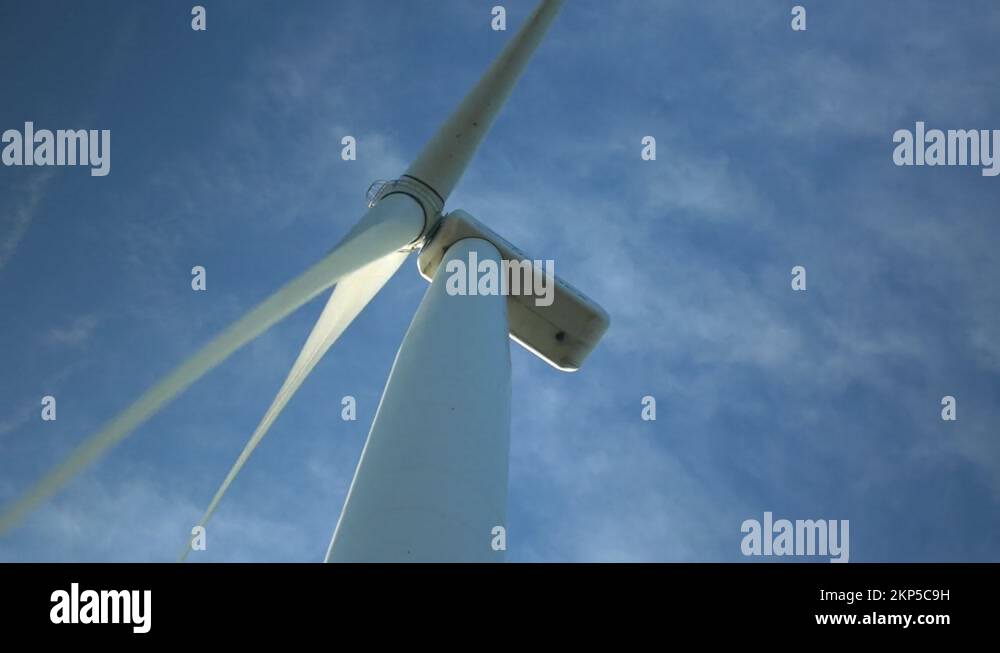 Wind turbine from below. Power of wind turbine generating electricity ...