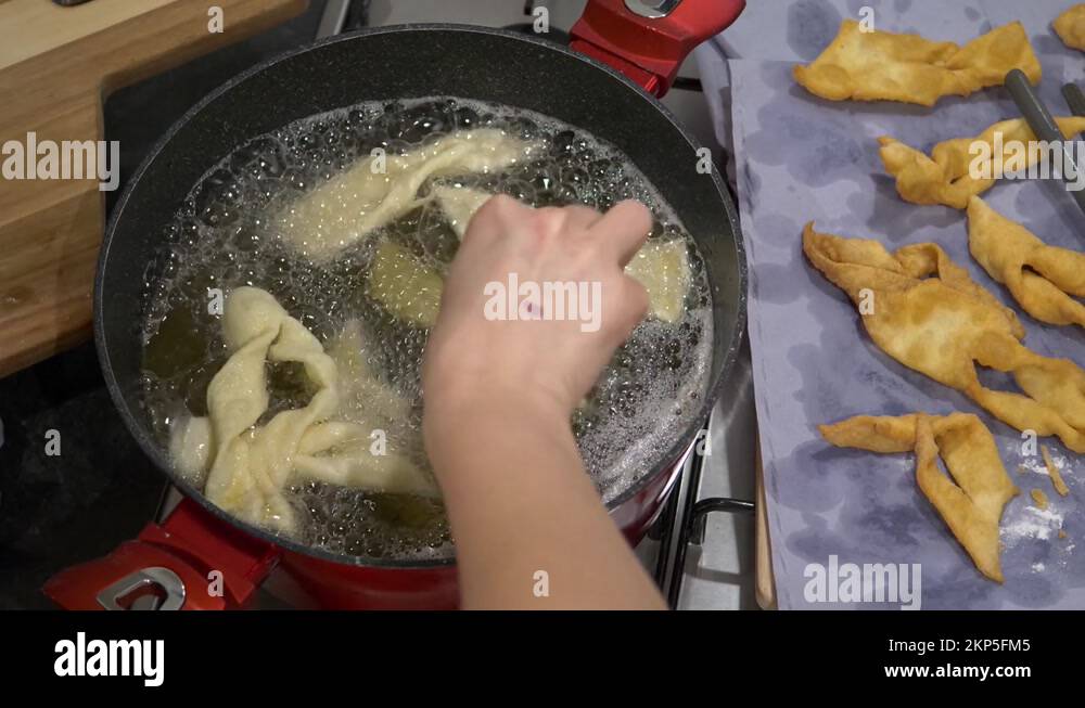 Angel Wings - Woman Cooking And Deep Fried Twisted Dough Of Faworki For ...