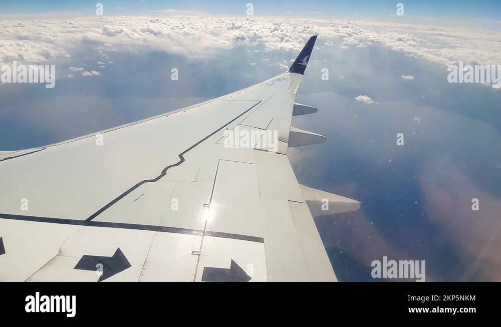 The plane is tilting. The plane turns. Plane wing Stock Video Footage ...