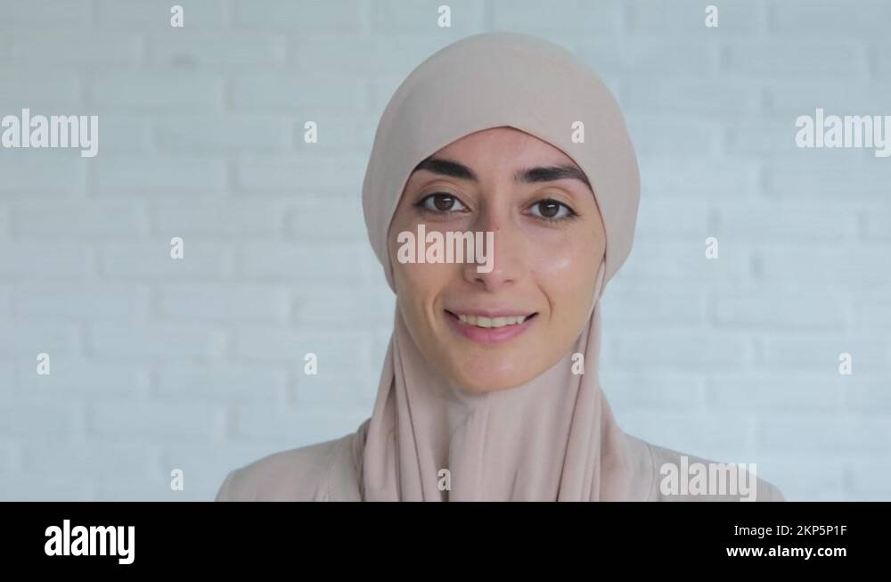 Close-up of the lips of a woman in a black hijab, a beautiful smile of ...