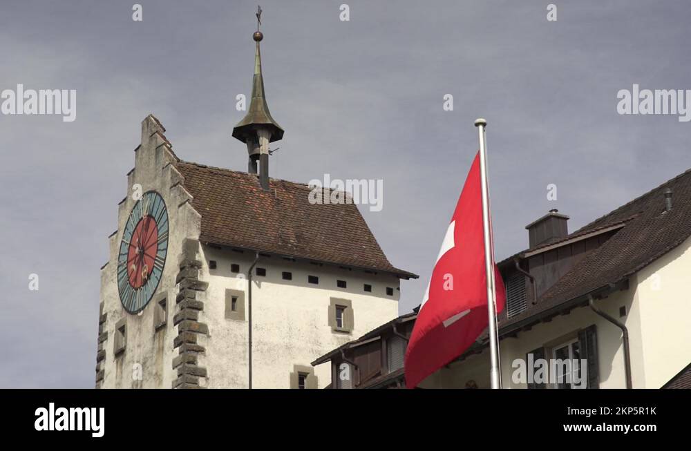 Swiss flag waving in Lucerne city. Low angle and static view Stock ...