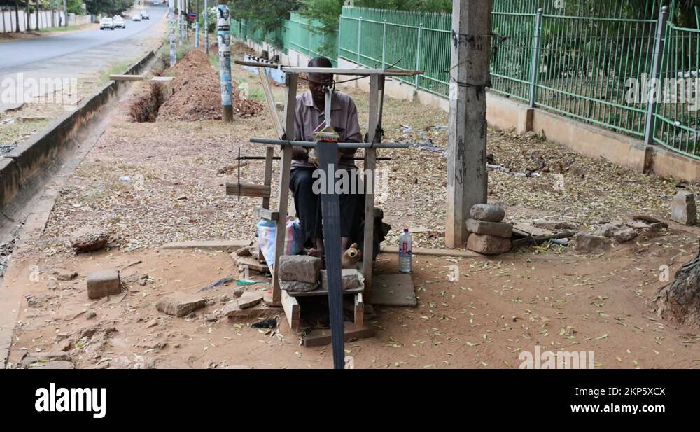 Handmade loom making Kente cloth fabric Accra Ghana 4K Stock Video ...