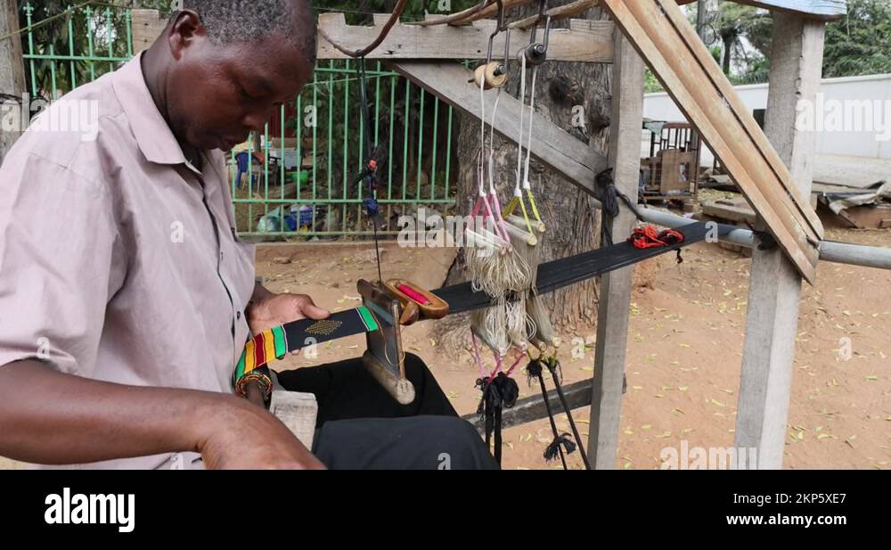 Man hand loom making Kente cloth fabric Accra Ghana 4K Stock Video ...