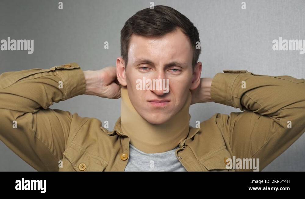 Man puts on bandage on neck to fix cervical vertebrae Stock Video ...