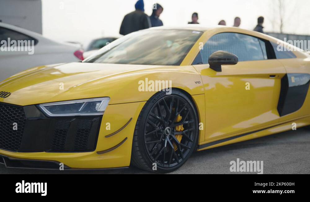 Yellow Audi R8 sportscar on display at exhibition for very expensive ...