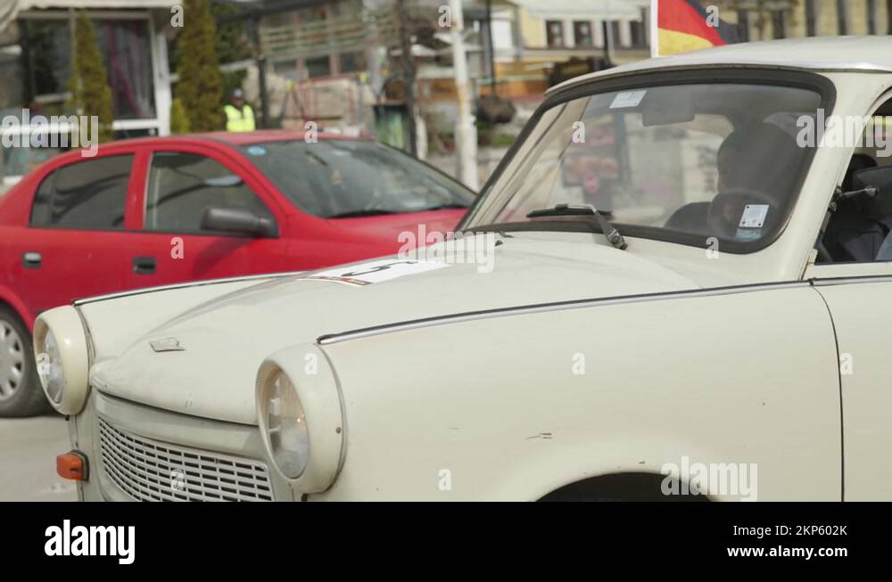 Convoy of Eastern European Trabant retro classic cars drive through ...