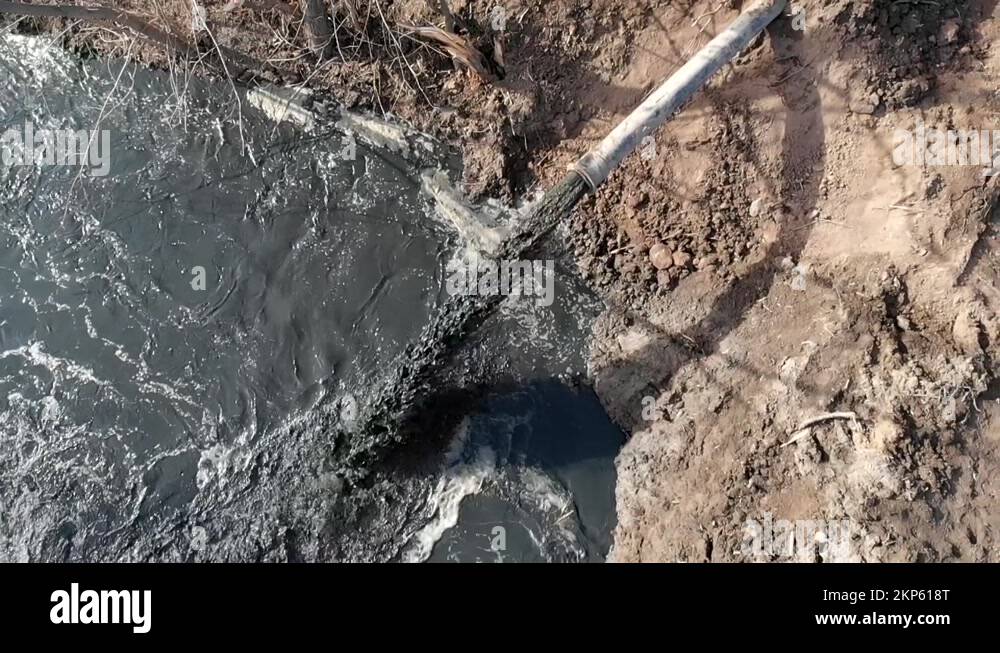 Dirty water flows from the pipe. Aquatic pollution. Ecological ...