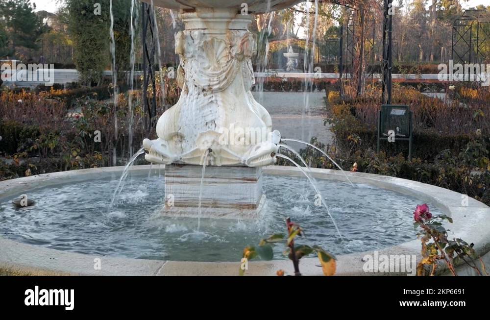 Pedestal of Pan god fountain at Rosaleda in Retiro Park, Madrid. Water ...